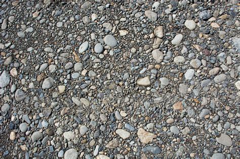 無数の小石が埋まるテクスチャーの写真素材 ぱくたそ