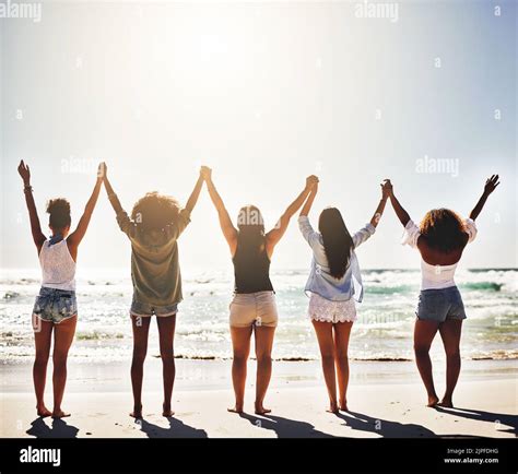 Because Beach Days Is What We Live For Rearview Of A Group Of