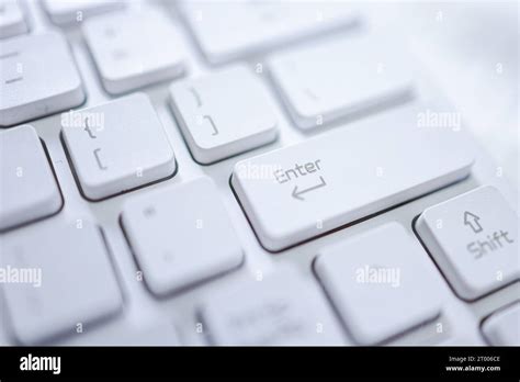 Hands Of Business Woman Pressing Enter Button On Computer Keyboard