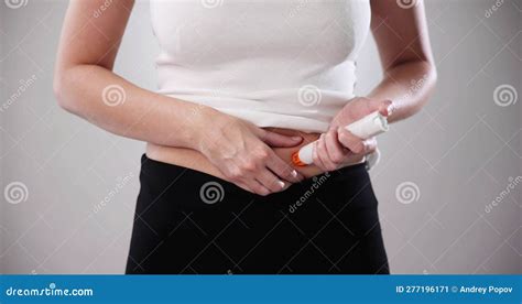 Man Injecting Epinephrine Using Auto Injector Syringe Stock Image 247761811
