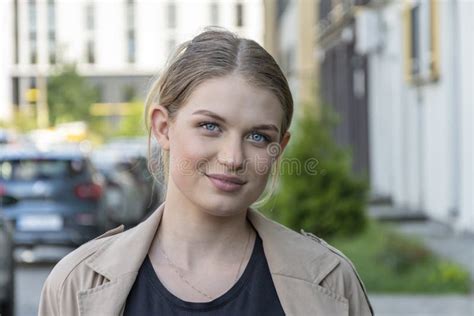 Street Portrait Of A Happy Young And Beautiful Blonde Girl 20 25 Years