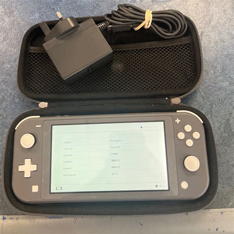 Pre Owned Microsoft Switch Lite Grey With Minecraft Own4less