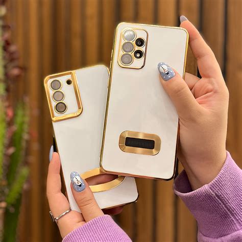 قاب گوشی سامسونگ دبل متال مای کیس مگ سیف دور طلایی محافظ لنز دار شیشه ای رنگ سفید Galaxy A53