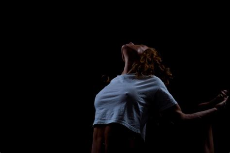 Premium Photo Woman Posing Against Black Background