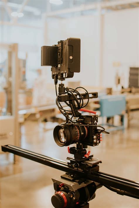Foto De Stock Gratuita Sobre Cámara Camara De Video Cámara Réflex Digital Cineasta