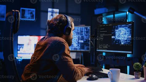 Developer Updating Artificial Intelligence Neural Networks Drinking Coffee And Listening Music