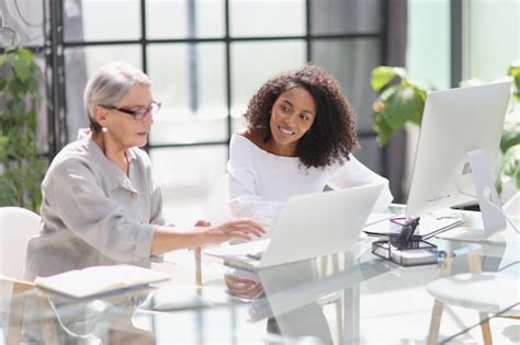 Premium Photo Software Development Team Discussing Algorithms On
