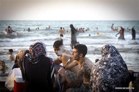 Iranians Enjoy Summer Holiday At Caspian Sea Beach Cn