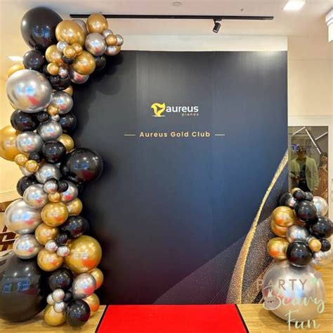 Backdrop Printing And Balloon Garlands Set Up For Corporate Event