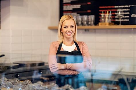 Premium Photo A Small Business Owner Is Standing At Pancake House And Smiling At The Camera