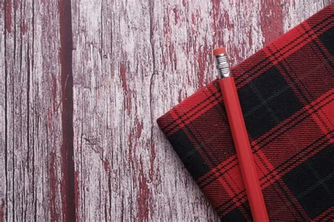 Premium Photo Top View Of Red Color Notepad And Pencils On Table With
