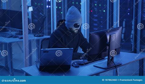 Hacker Breaking Code Criminal Hacker With Black Hood Penetrating Network System From His Dark