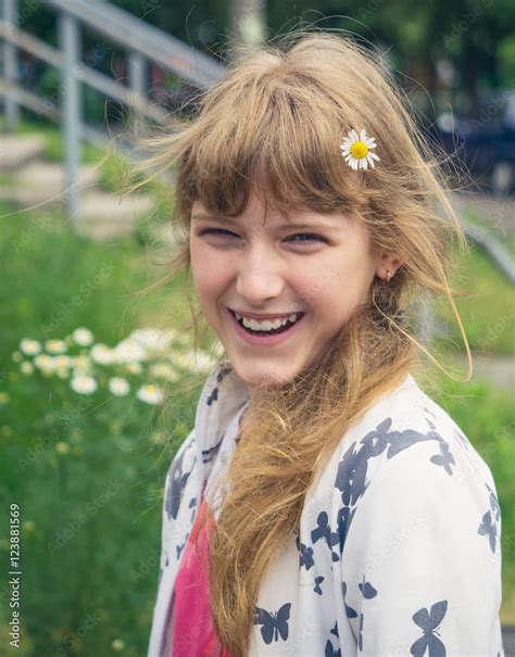 Portrait Of Funny Pretty Teenage Young Girl Smiling Smirking Laughing