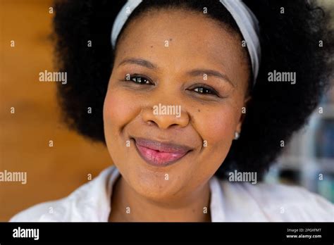 Portrait Close Up Of Happy Plus Size African American Woman Looking At