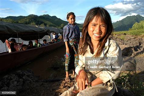 Laos Luang Prabang A Laotian Girl In Water Photos And Premium High Res