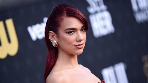 Dua Lipa Flaunts Her Slim Figure And Legs For Days In Washed Black Bodysuit