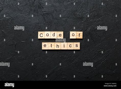 Code Of Ethics Word Written On Wood Block Code Of Ethics Text On Table