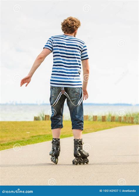 Young Man Rollerblading Outdoor On Sunny Day Stock Image Image Of Recreational Pursuit 105142937