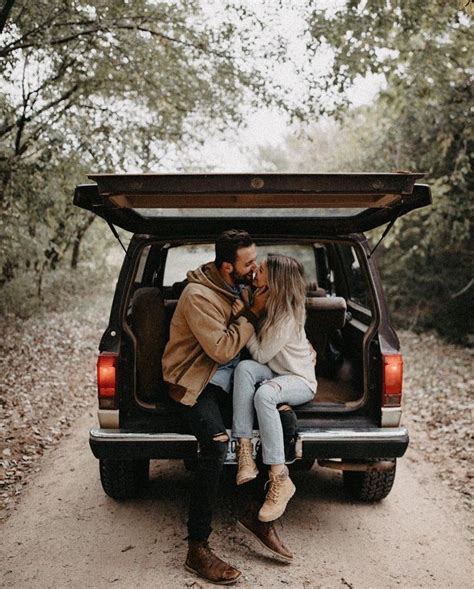 Cozying Up In The Back Of Their Truck During This Romantic Fall