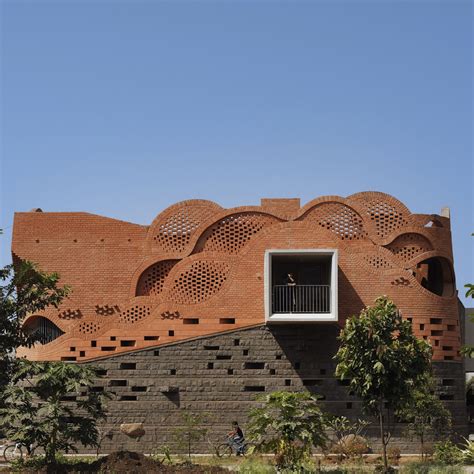 Rippling Red Brick Facade Shades House In Surat By Design Work Group
