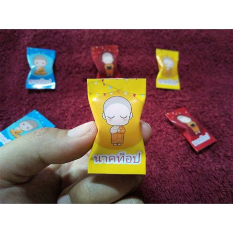 เหรียญโปรยทานงานบวชสมัยใหม่สุดล้ำ ซองขนมซองลูกอมเก๋ๆ แพค 100 แผ่น ไม่สามารถระบุชื่อนาคได้