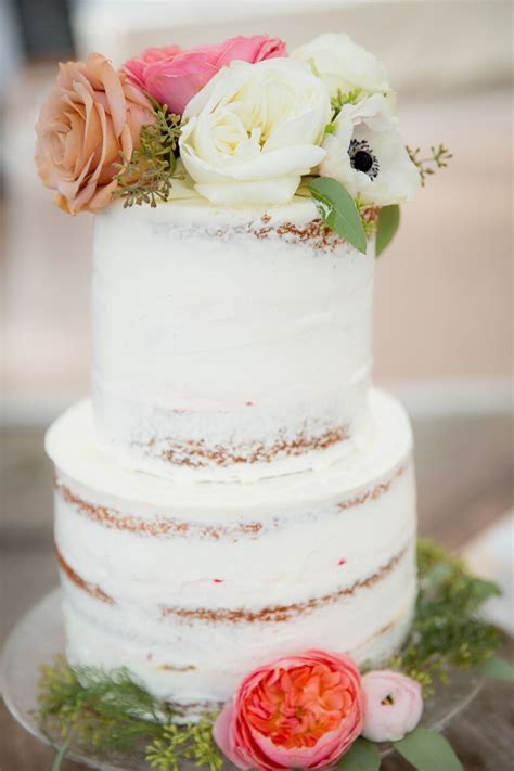 Paired With Fresh Florals This Partially Naked Cake Is Perfect For