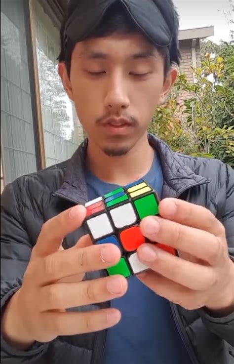 guy solves rubik s cube blindfolded while reciting digits of pi credit