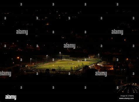 Football Pitch Or Soccer Field At Night Sit Up By Artificial Lamps