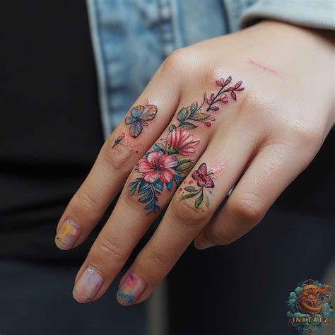 Minimalist Flower Finger Tattoo