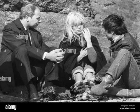 Brigitte Bardot And Director Serge Bourguignon On Location During The Making Of Two Weeks In