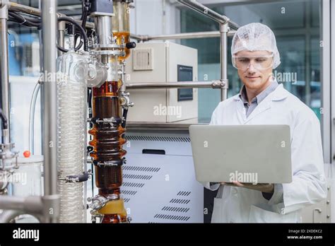 Scientist Working With Equipment In Science Lab Medical Factory Staff Cannabis Cbd Oil