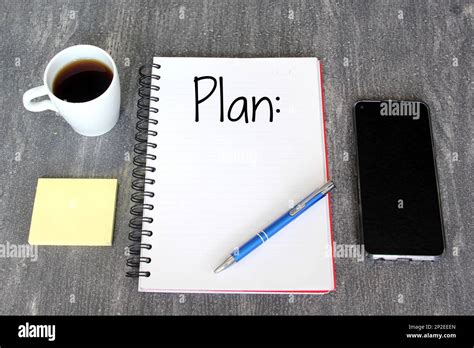 Notepad With Message In Spanish Laguage Plan Coffee Cell Pen And