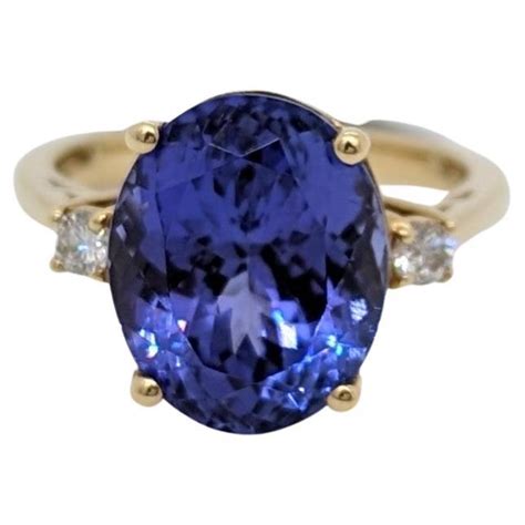 Tanzanite Oval And White Diamond Ring In 14k Yellow Gold For Sale At