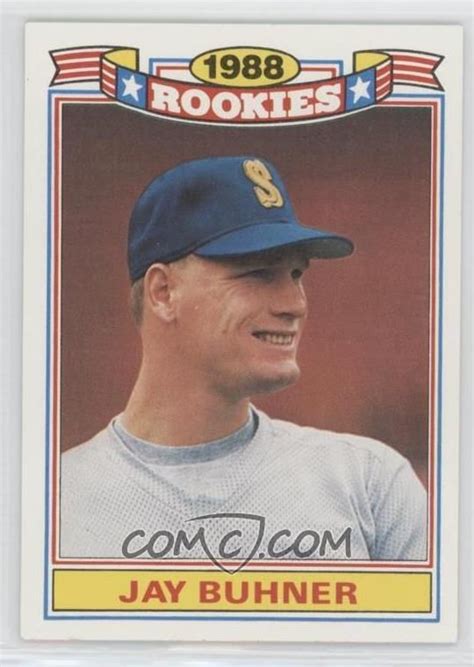 A Baseball Card With A Man Wearing A Blue Hat On Its Head And An