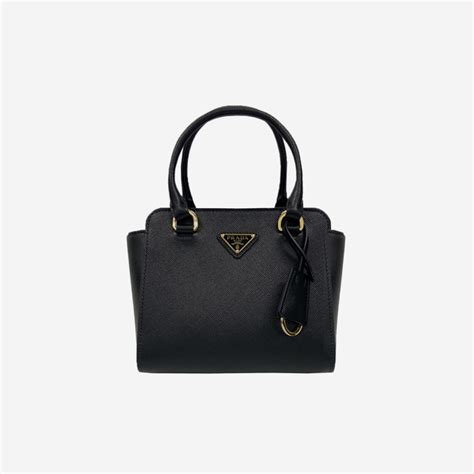 프라다 트라이앵글 로고 사피아노 레더 미니 토트백 블랙 Prada Kream