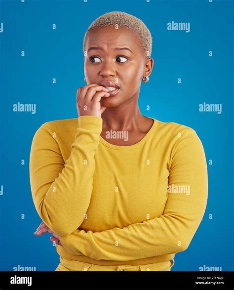 Nervous Worried And Scared Black Woman In Fear And Bitting Nails