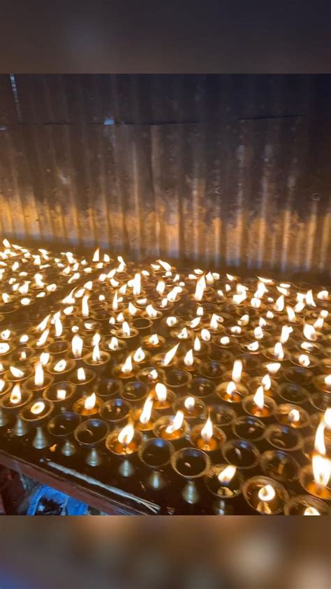 lighting candle boudhanath temple there is specific area where you
