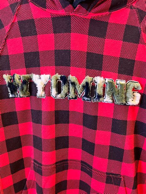 Wyoming Buffalo Plaid Camouflage Lettering Hoodie Outlaw Ts