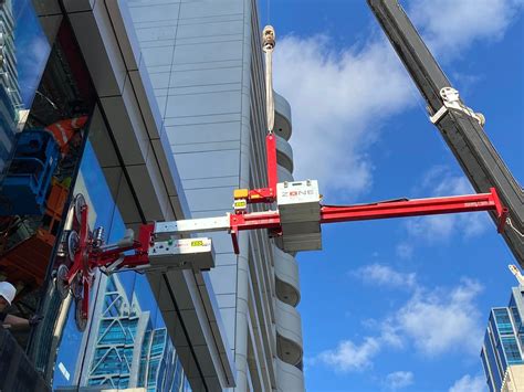 Crane With Offset Lifting Beam And Oktopus Glass Lifter Zone Group