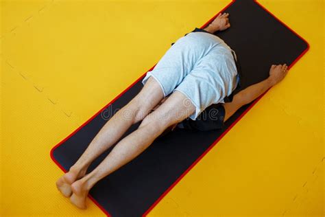 Healthy Man Doing Exercises On A Yellow Background Stock Photo Image Of Activity Healthy