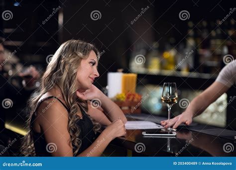 Cute Blonde Girl Ordered Wine From The Bartender In A Nightclub Stock Image Image Of Female