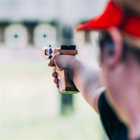 Premium Photo Woman On Sport Shooting Training Shooting Target