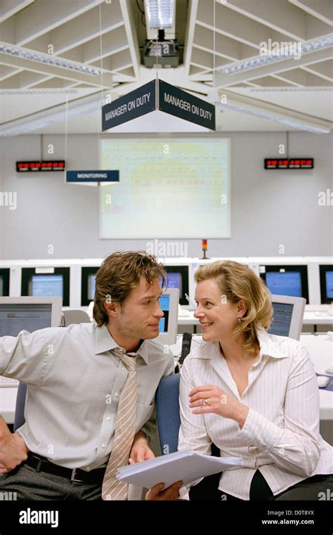 Business People Data Center Control Center Man Woman License Free Except Ads And Outdoor