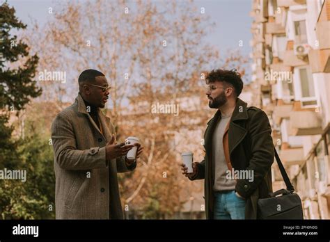 Diverse Male Coworkers Programmers Discussing How To Error In The Code Can Be Solved They Are