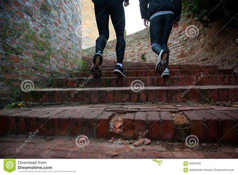 Man And Woman Running Upstairs Together Stock Image Image Of Male Adventure 63932455