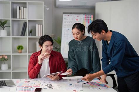 Interactive Design Brainstorming Session A Team Engages In Lively