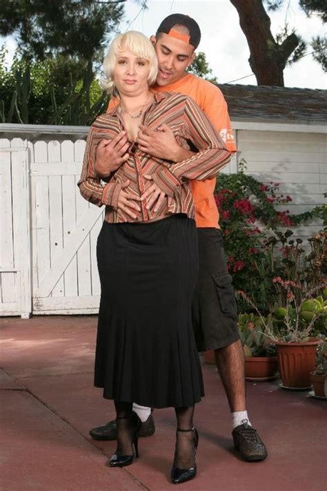 Blonde Milf Stripping Off Her Clothes And Pleasuring A Younger Guy With