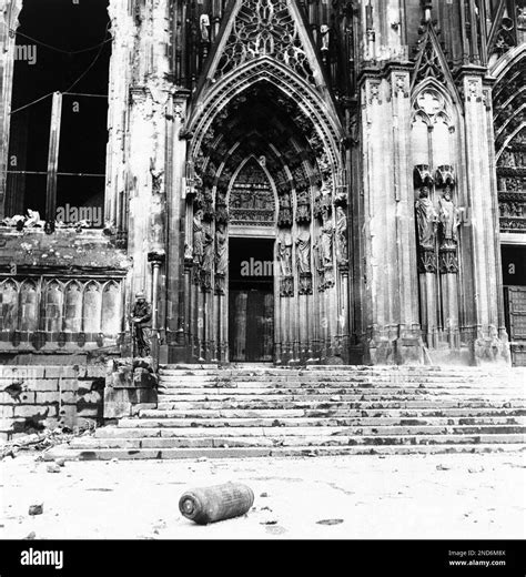 An Unexploded Bomb Lies On The Pavement In Front Of The Famous