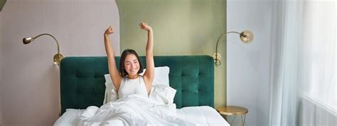 Premium Photo Portrait Of Smiling Happy Asian Girl Wakes Up Feeling