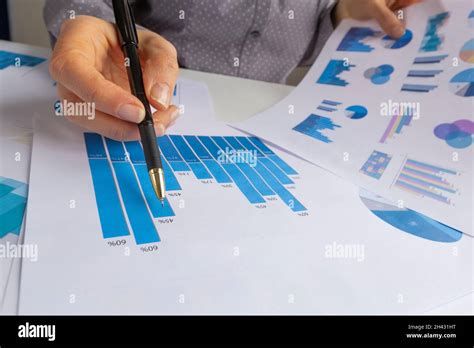 Statistical Reports Analysis On Paper Many Business Financial Growth Charts On Your Desktop
